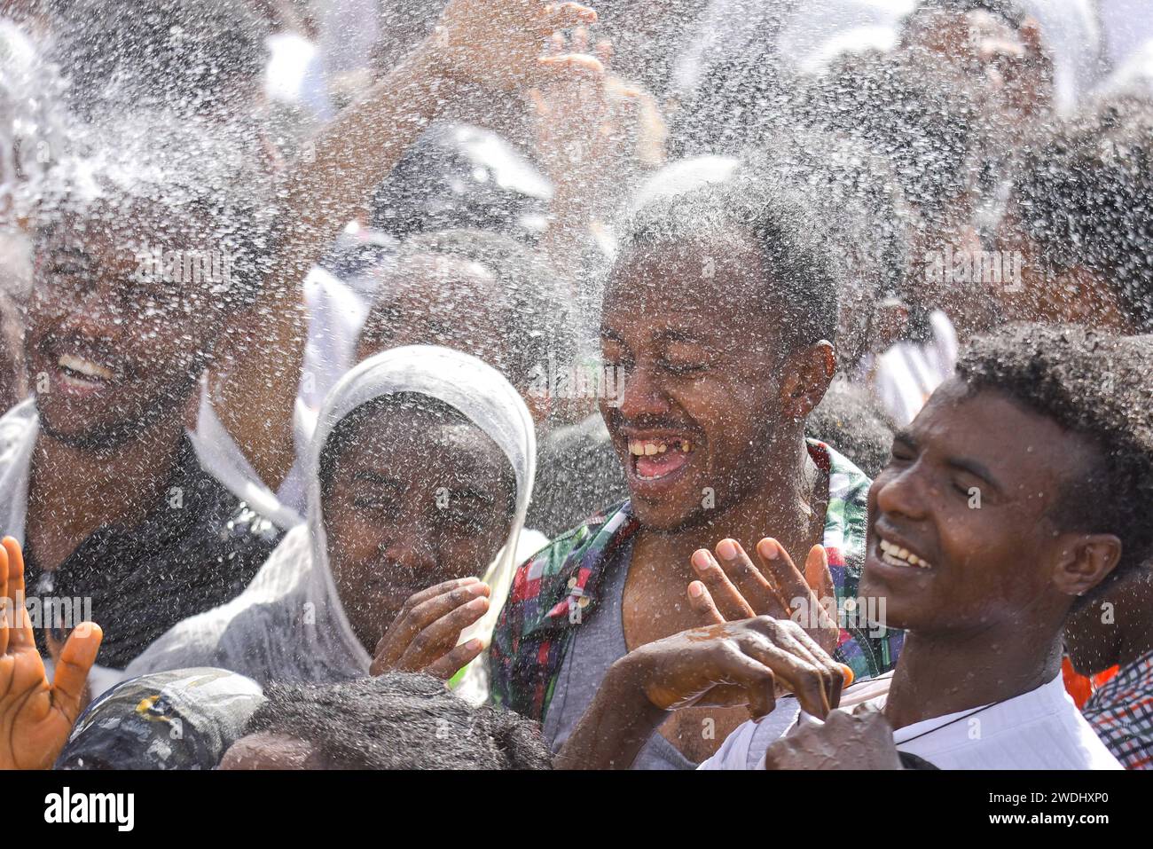 Addis Ababa, Ethiopia. 20th Jan, 2024. Holy water is sprinkled onto the ...