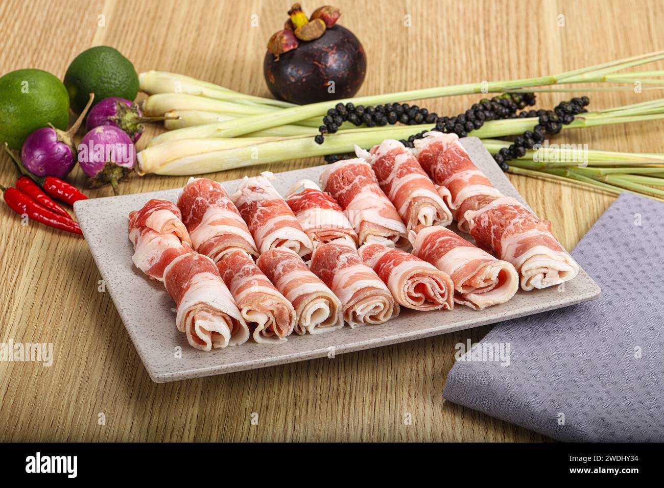 Raw beef bacon roll for grill Stock Photo - Alamy