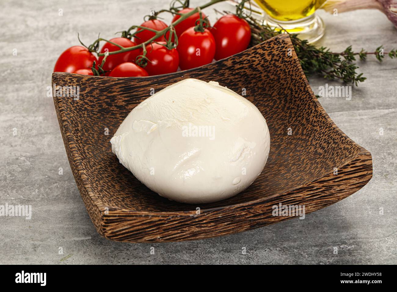 Round Mozzarella young cheese ball for salad Stock Photo - Alamy