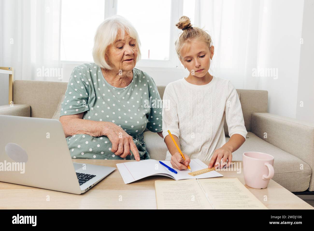 Child grandmother laptop family hugging Stock Photo - Alamy