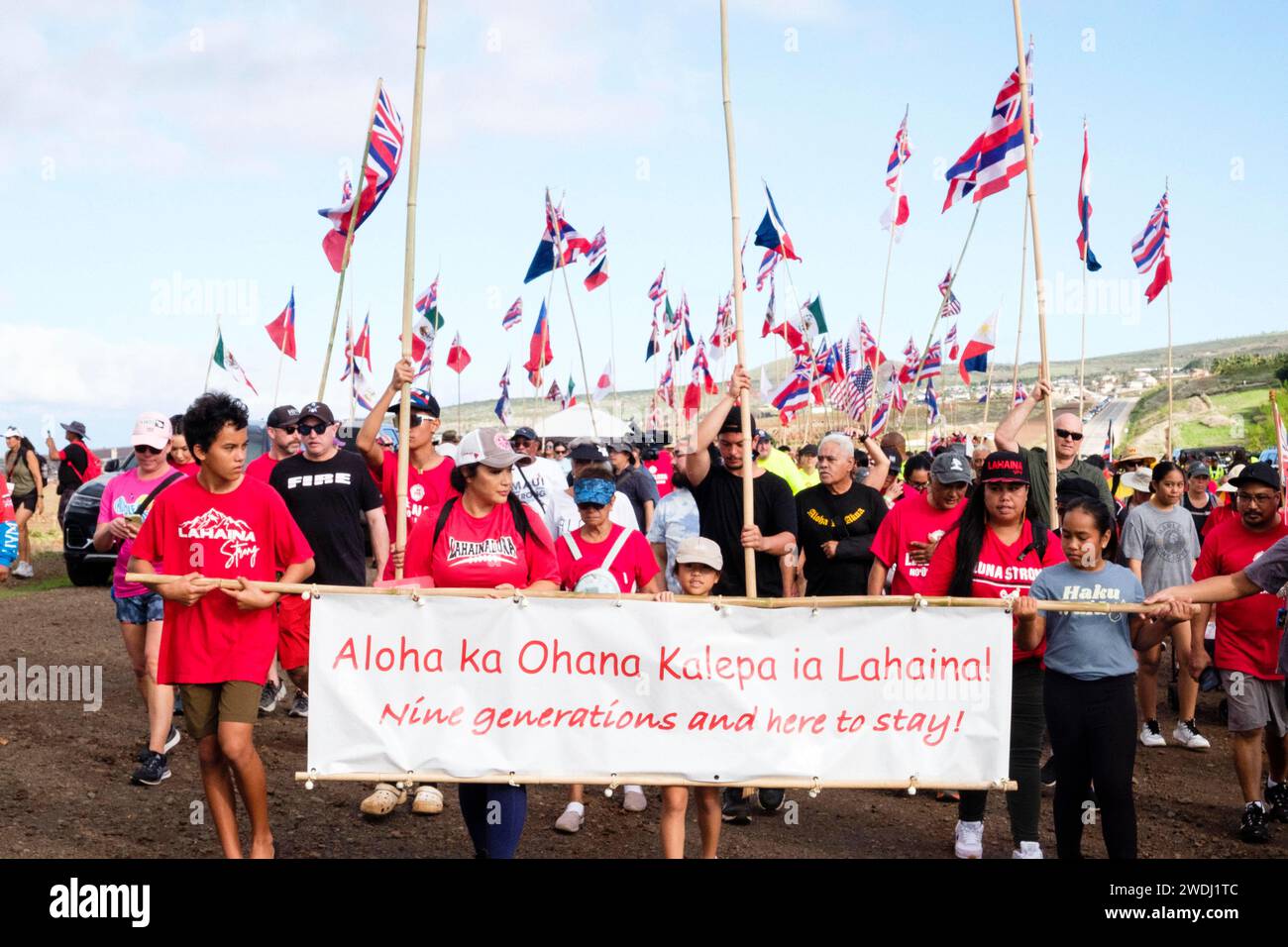 Lahiana, Hawaii, USA. 20th Jan, 2024. Kalepa family members march in ...