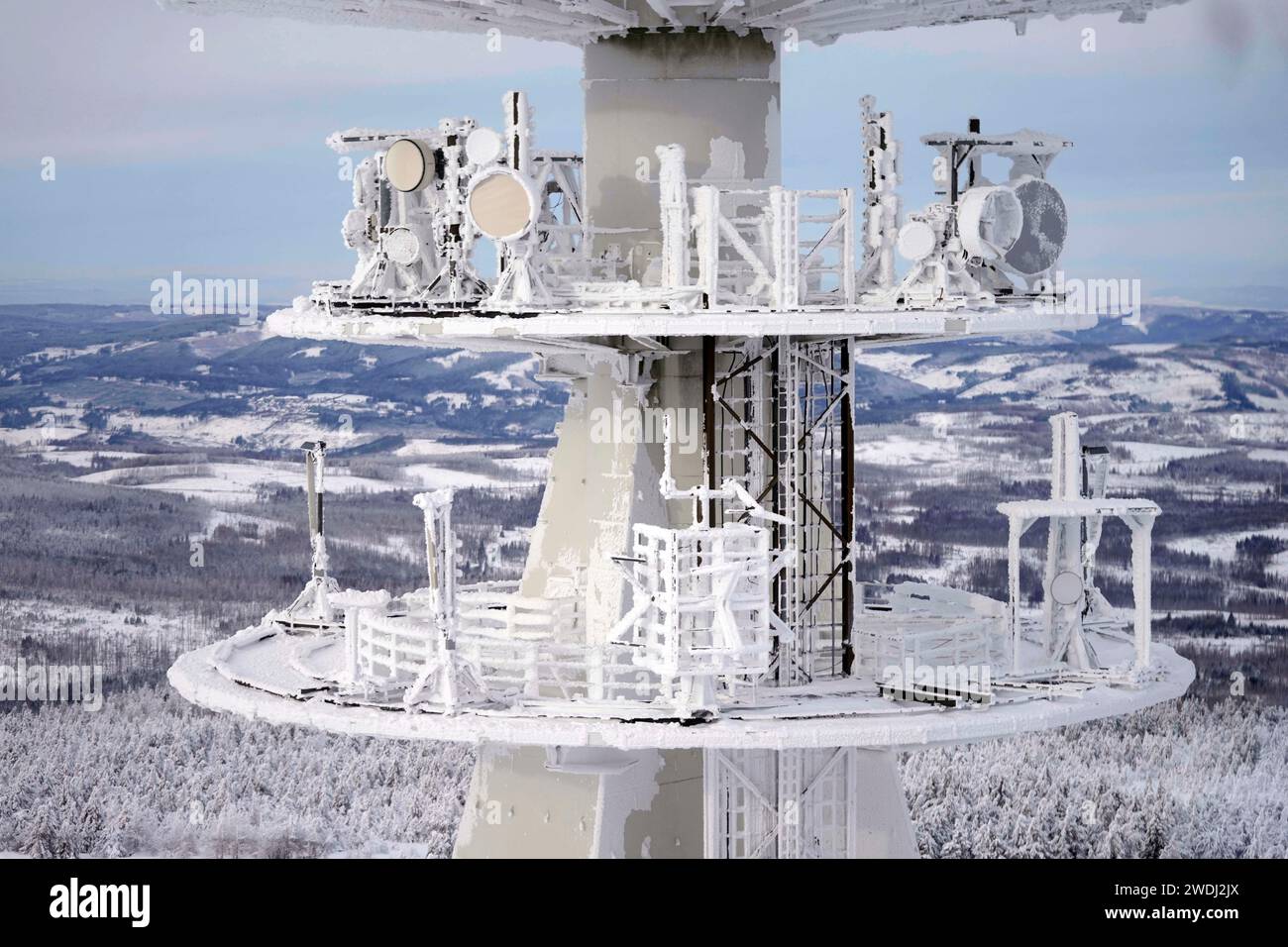 Snow and ice cover tv and telecommunication antennas on top of of ...