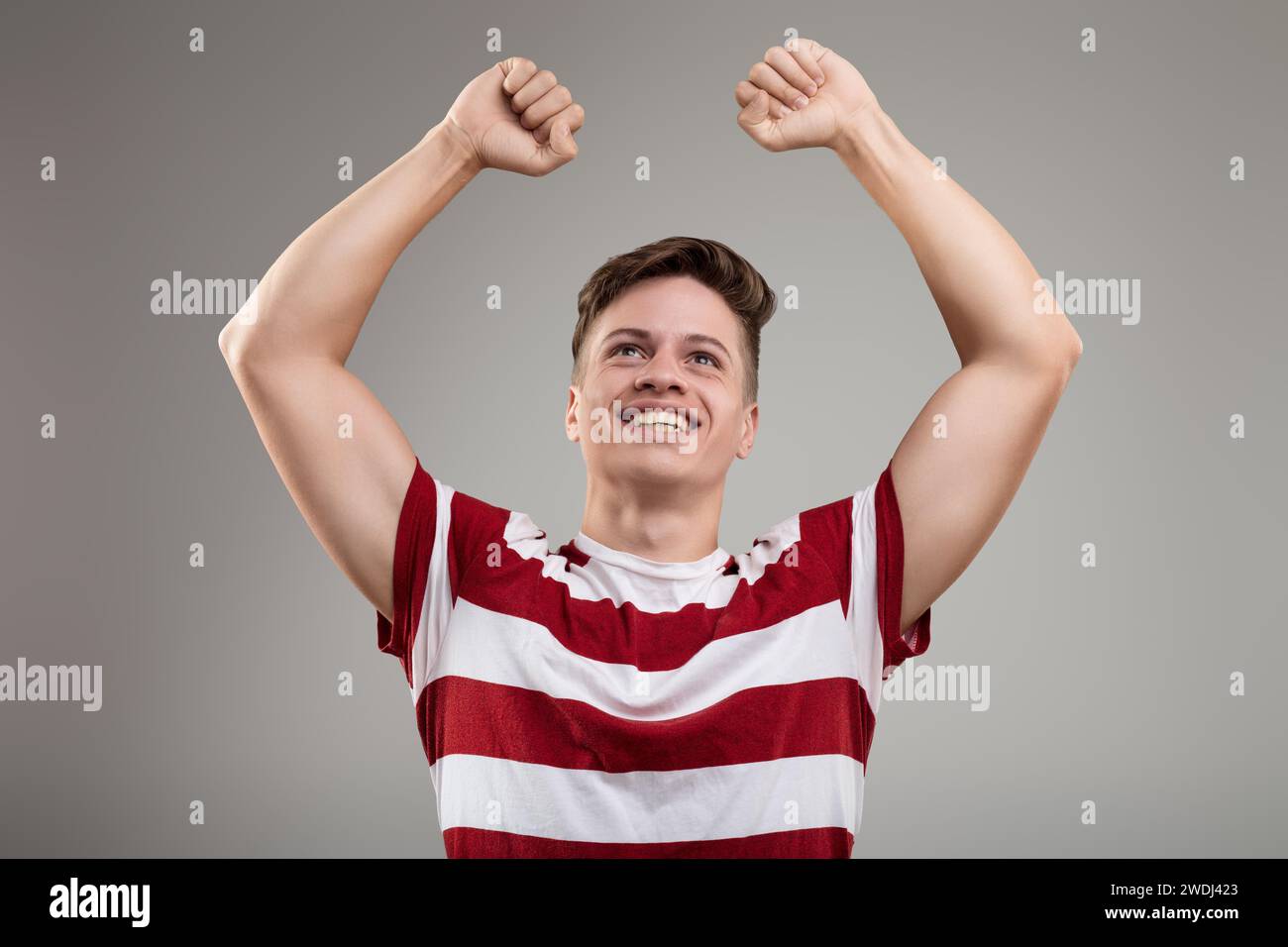 Uplifted fists hi-res stock photography and images - Alamy