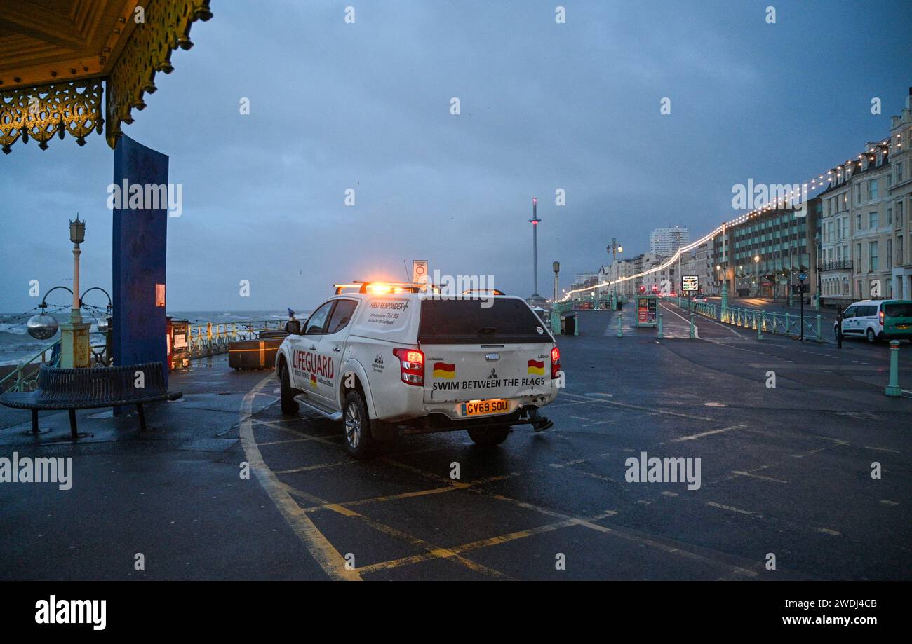 Brighton UK 21st January 2024 - A Lifeguard patrol checks out Brighton ...