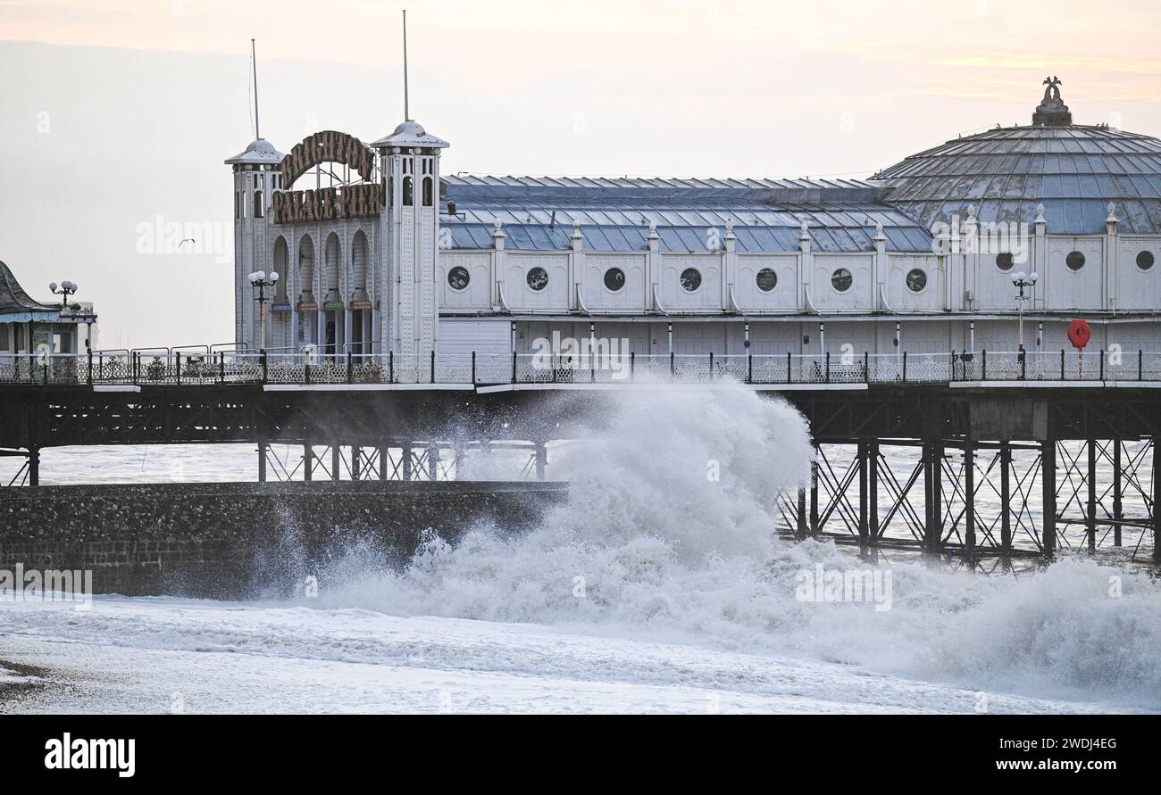 Brighton UK 21st January 2024 - Waves crash in by Brighton Palace Pier ...