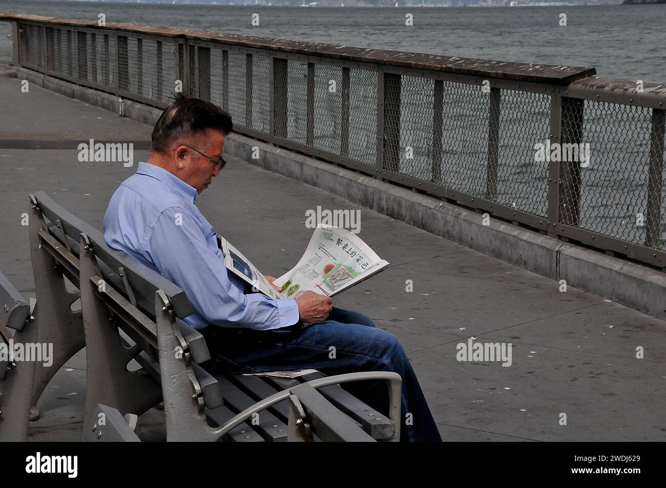 San Francisco /california/ 15 September 2019/ Male reading chiense ...