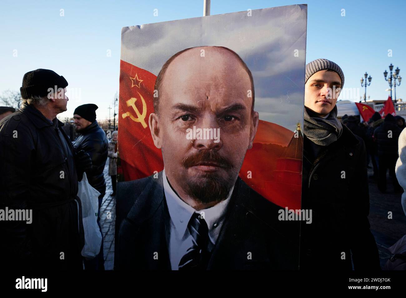 Russian Communist supporters carry portrait of Vladimir Lenin as they ...