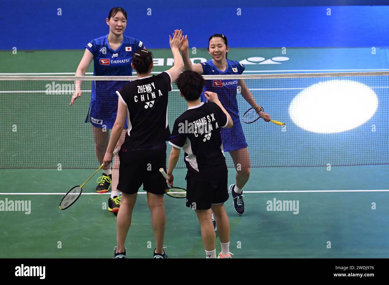 Japan's Mayu Matsumoto, first left, and Wakana Nagahara greet China's ...