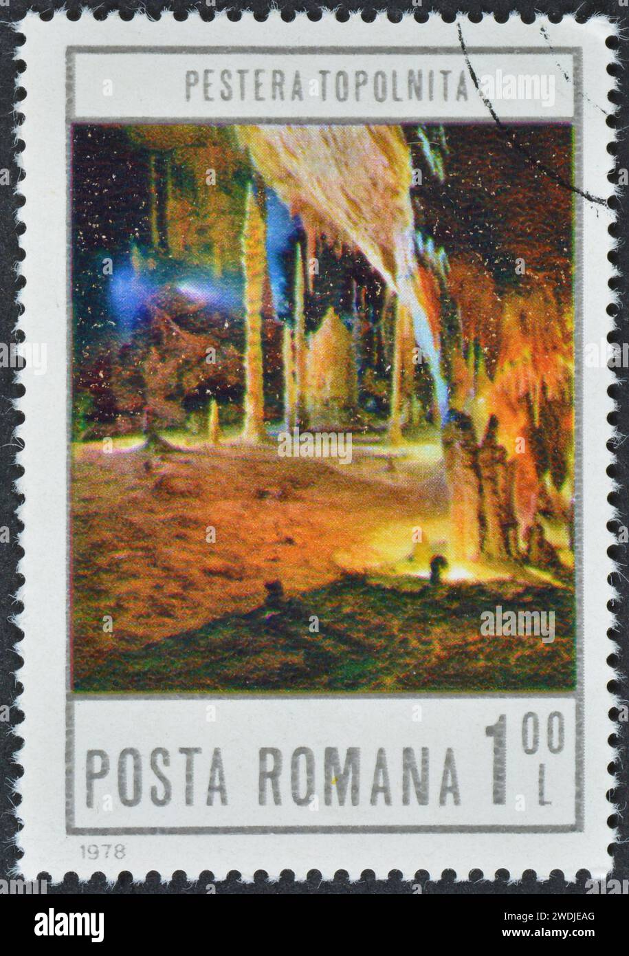 Cancelled postage stamp printed by Romania, that shows Topolnita cave ...