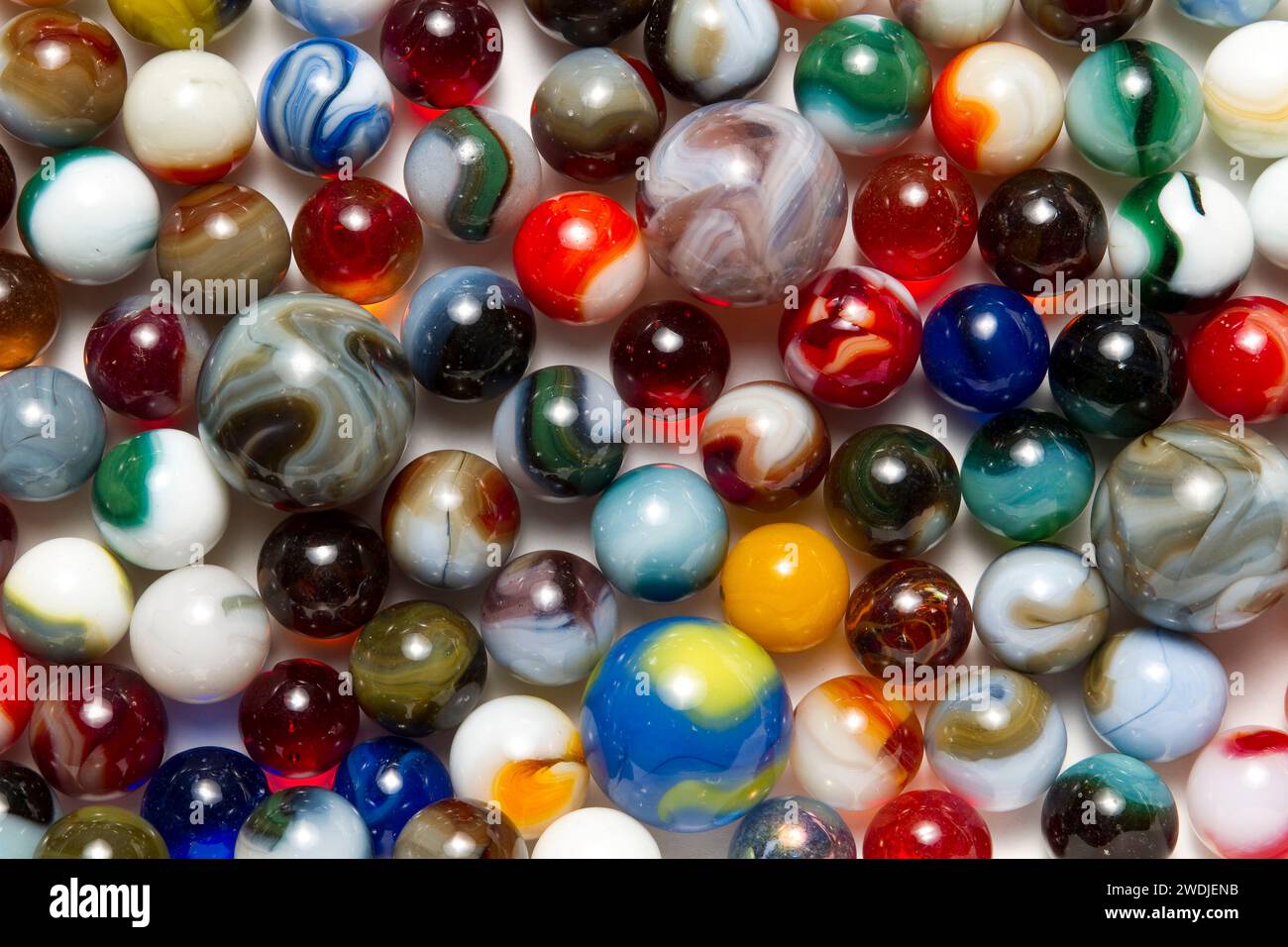A collection of colorful glass marbles Stock Photo - Alamy