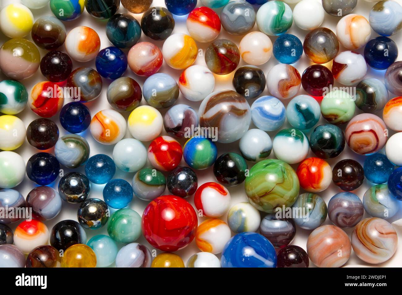 A collection of colorful glass marbles Stock Photo - Alamy