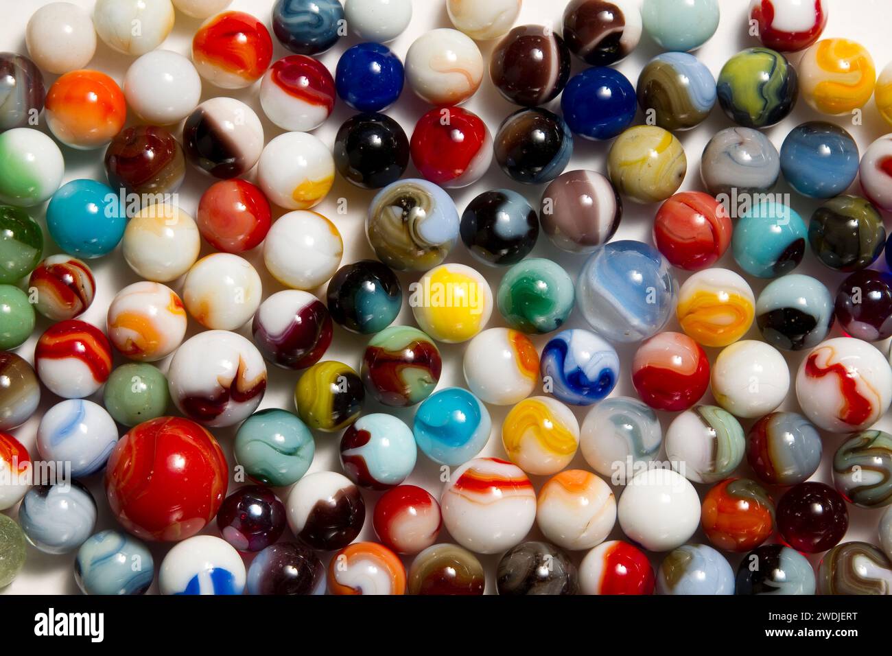 A collection of colorful glass marbles Stock Photo - Alamy