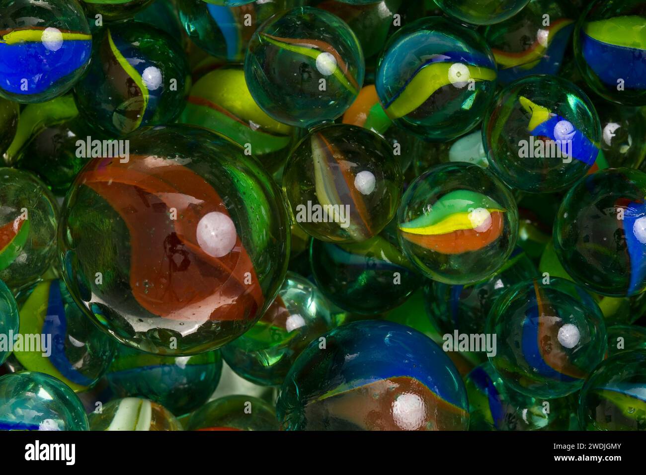 A collection of cat eye marbles Stock Photo - Alamy