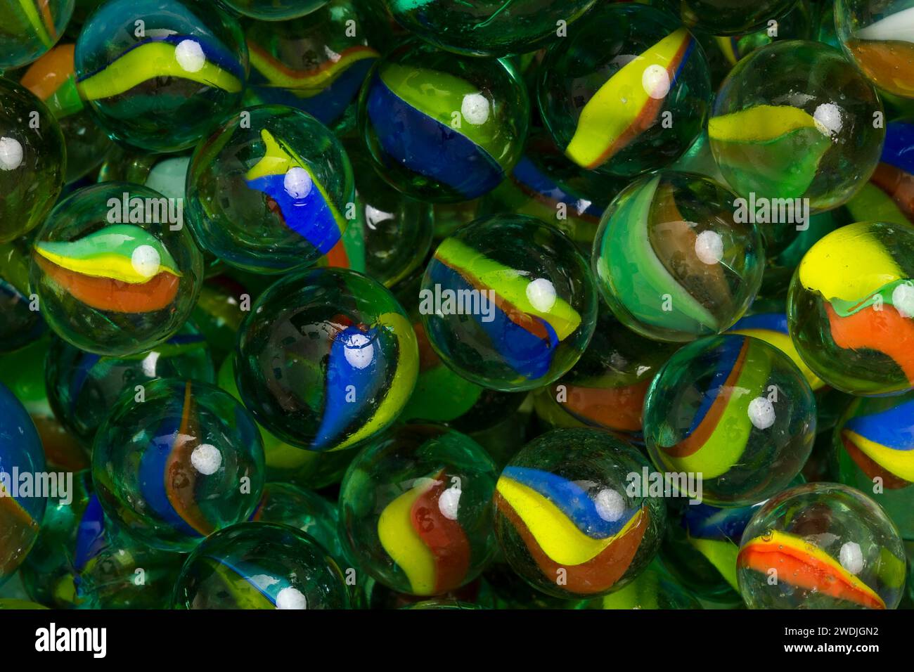 A collection of cat eye marbles Stock Photo - Alamy