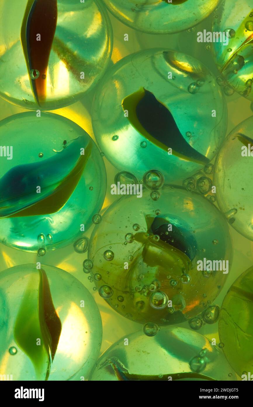 Cat Eye Marbles In Clear Soda Stock Photo - Alamy