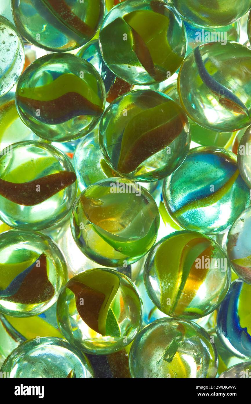 A collection of cat eye marbles Stock Photo - Alamy
