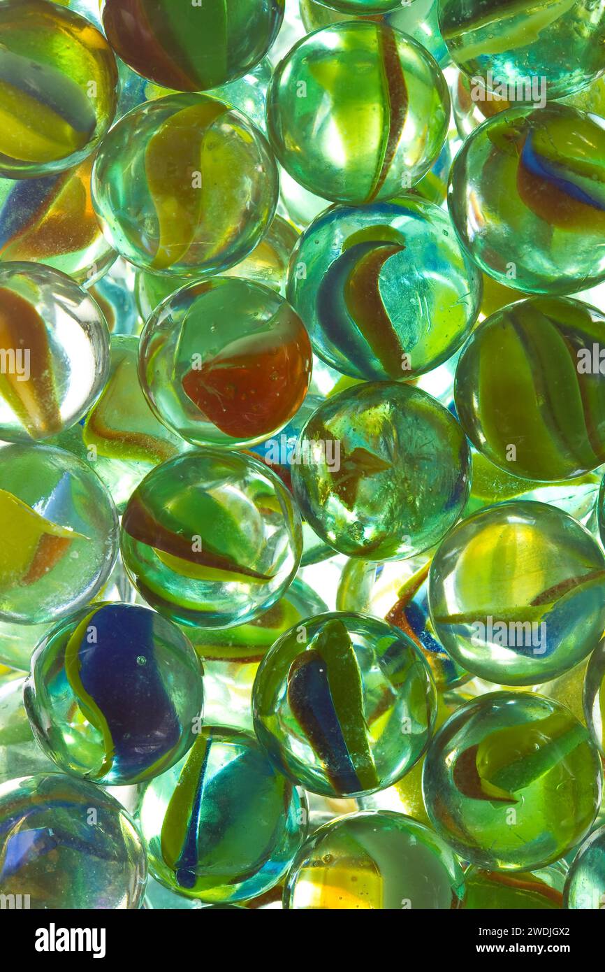 A collection of cat eye marbles Stock Photo - Alamy