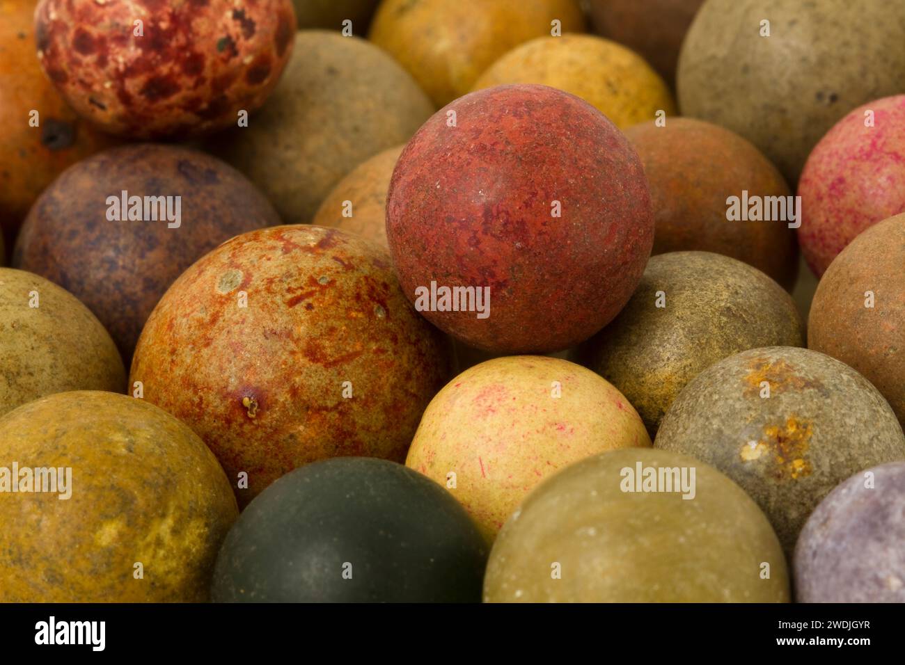 A collection of vintage clay marbles Stock Photo - Alamy