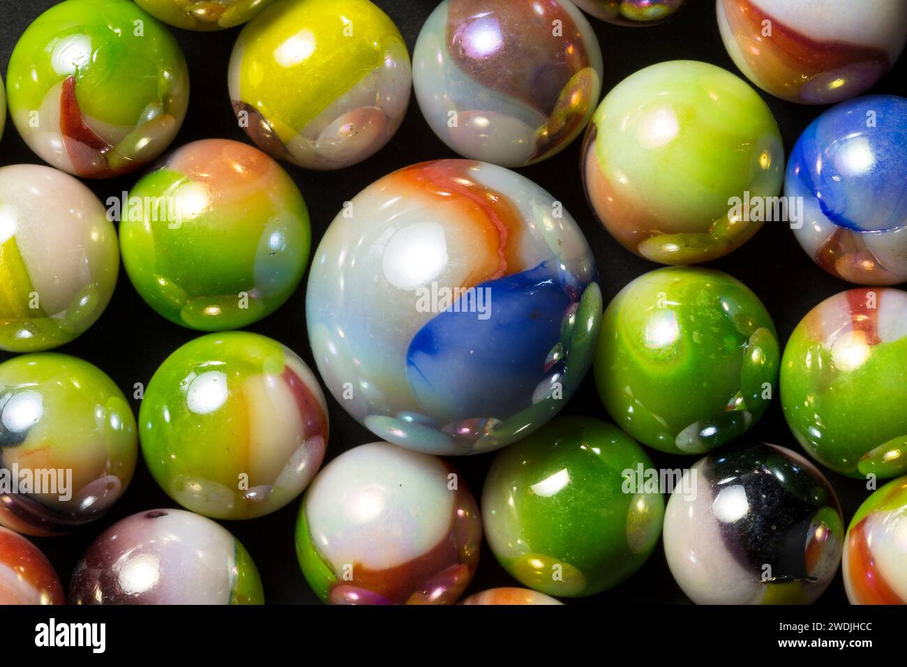A collection of colorful glass marbles Stock Photo - Alamy