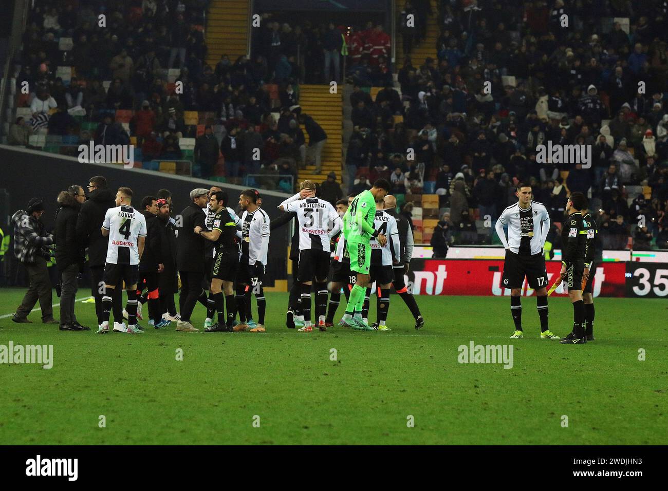 Referee Fabio Maresca, eight from left, match officials, right, and Udinese's players gather as ...