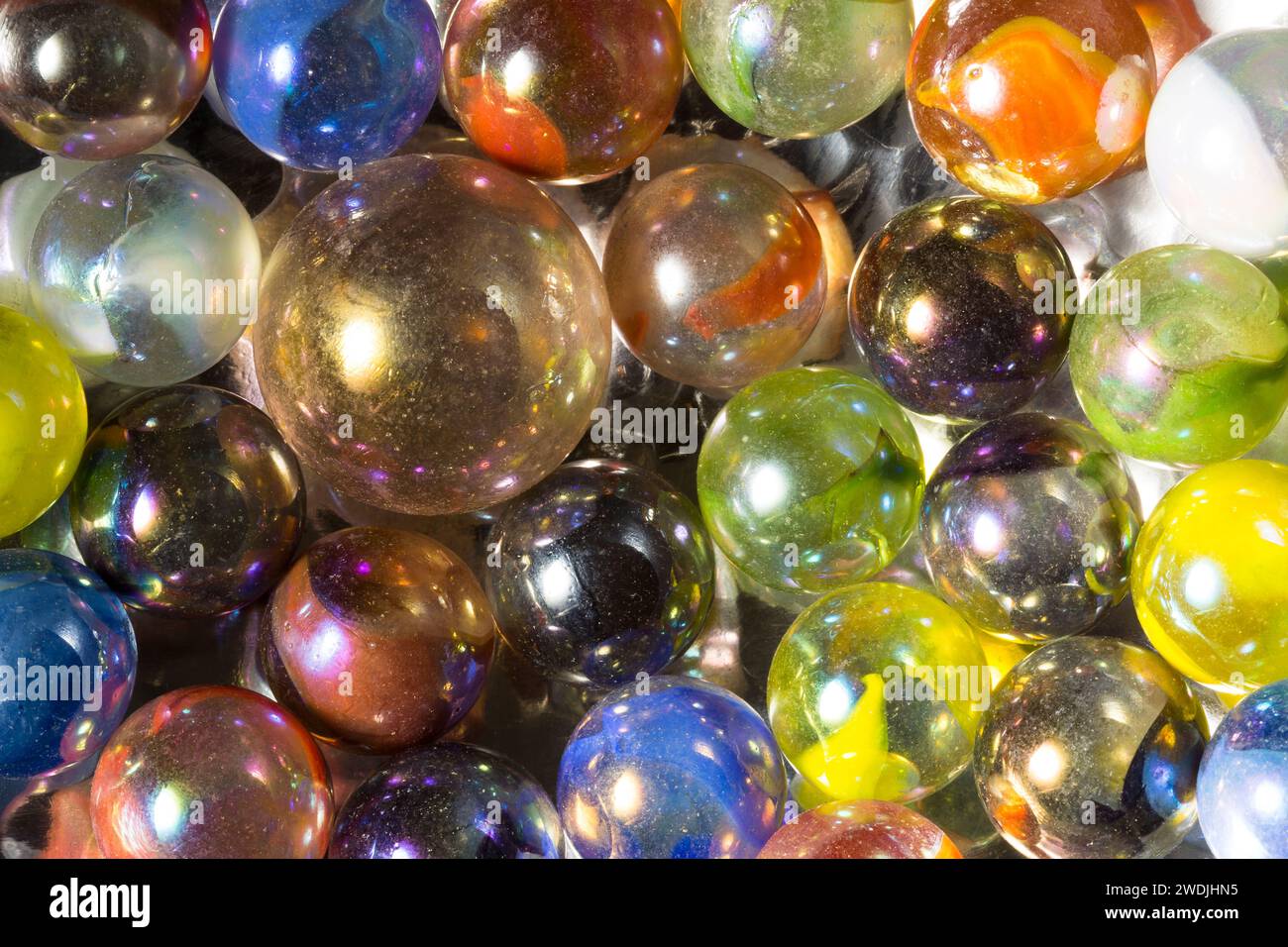 A collection of colorful glass marbles Stock Photo - Alamy