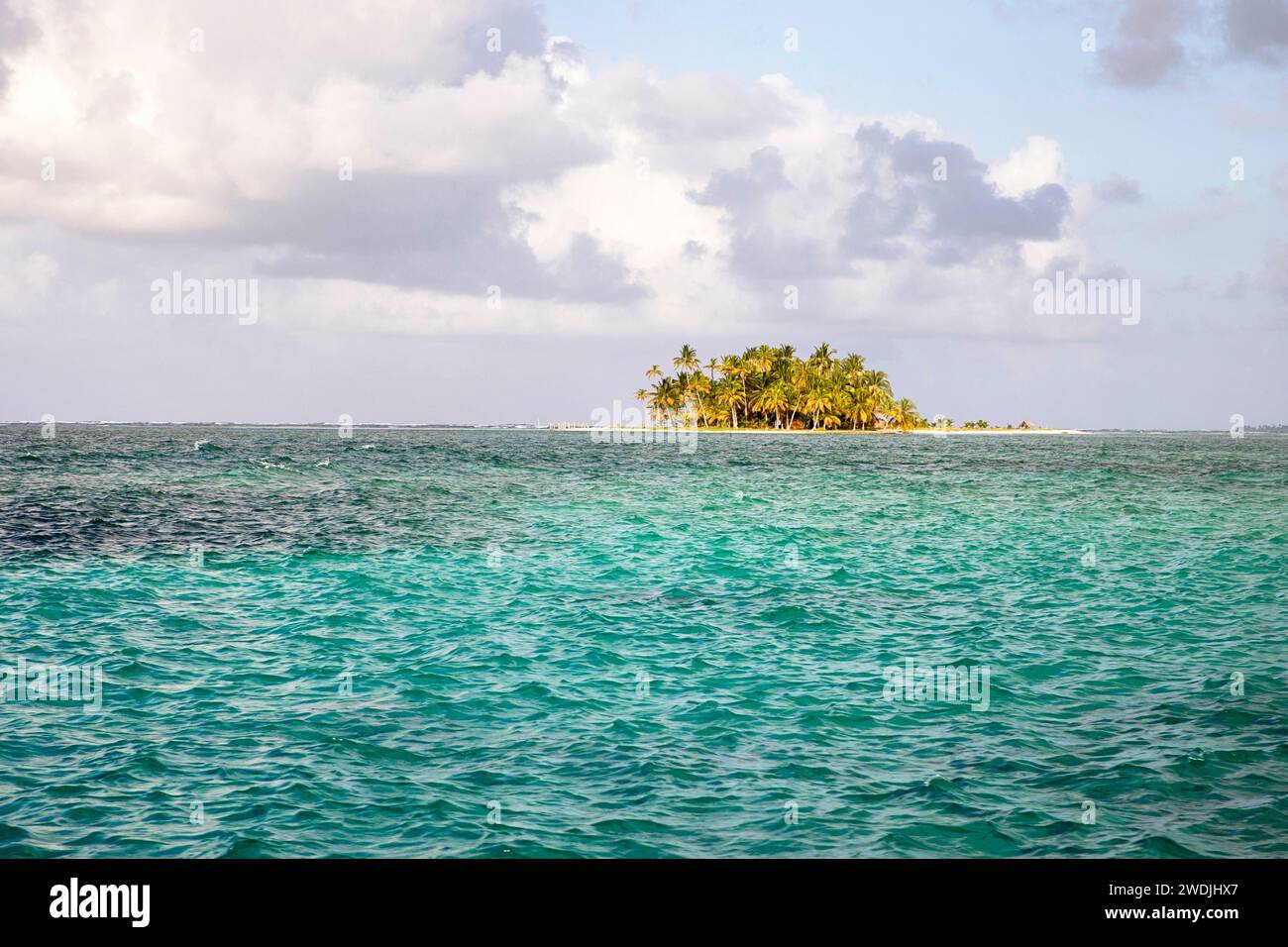 Picturesque small tropical island with palm trees, traditional kuna ...