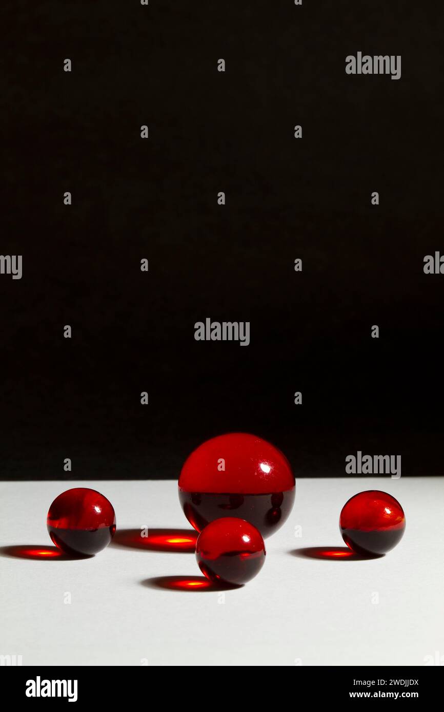 Red Glass Marbles Stock Photo - Alamy