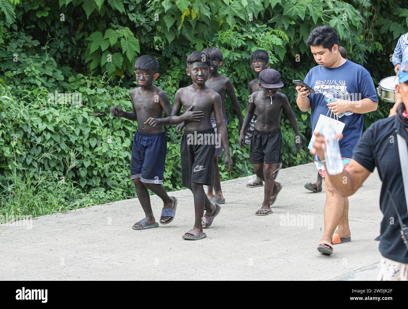 Laguna, Philippines : Children wearing black makeup (Ati-Atihan) during ...