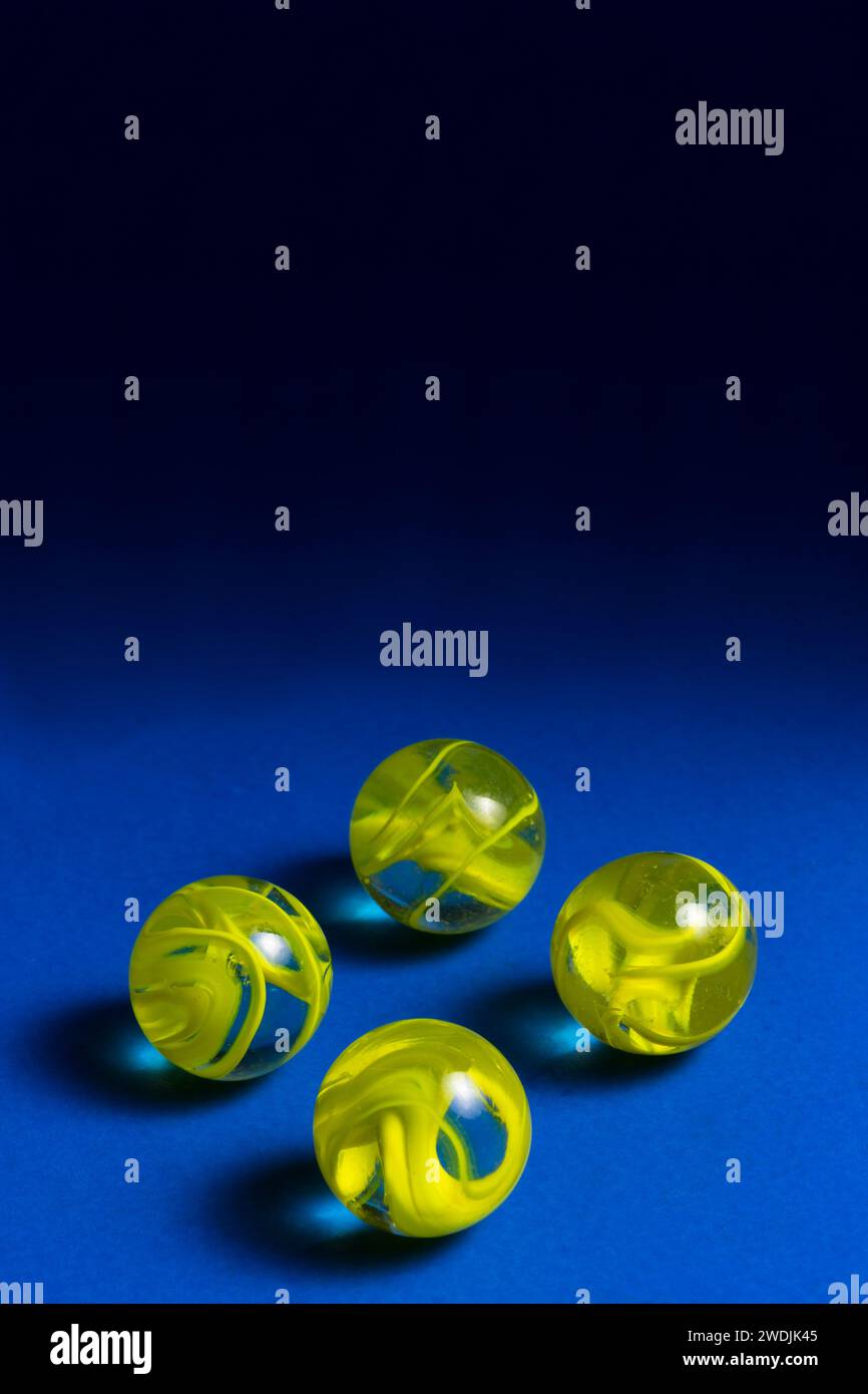 Four marbles hi-res stock photography and images - Alamy