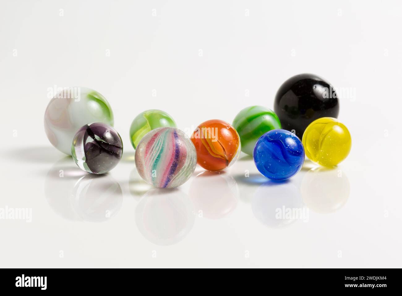 A collection of vintage glass marbles Stock Photo - Alamy