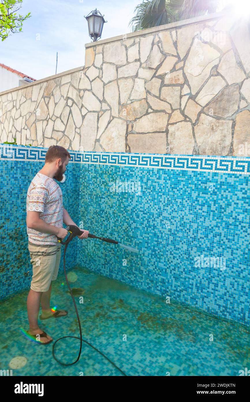 Pressure washing pool hi-res stock photography and images - Alamy