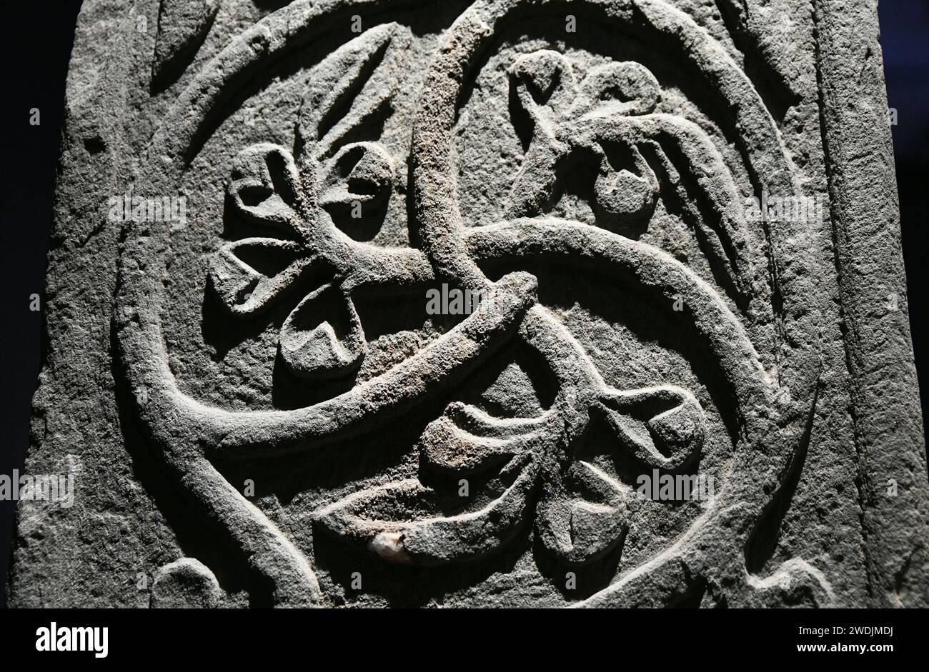 Carving in stone of geometric pattern with flowers on a cross, Iona ...