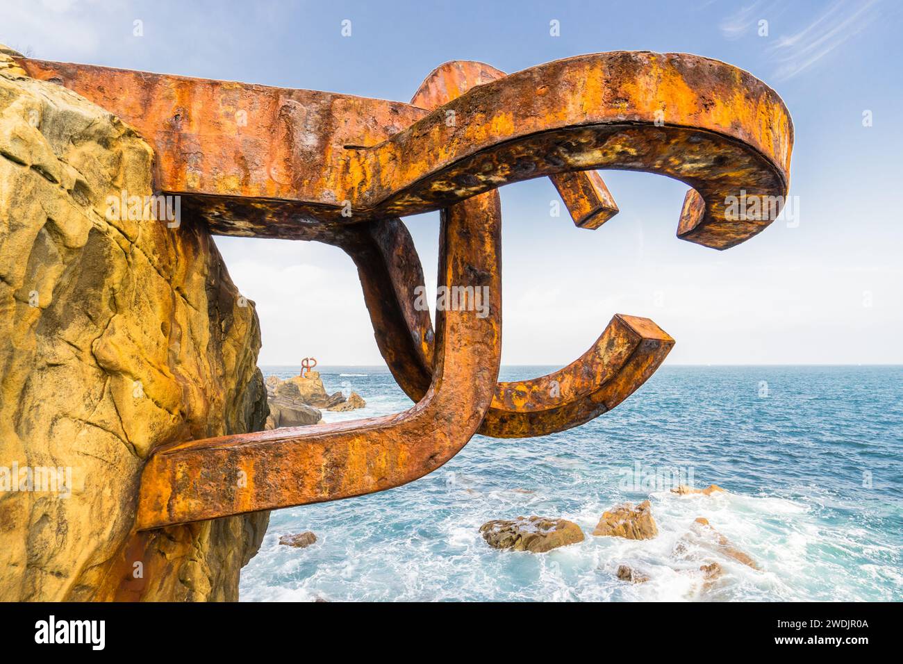 An old rusty anchor on a seaside rock Stock Photo - Alamy