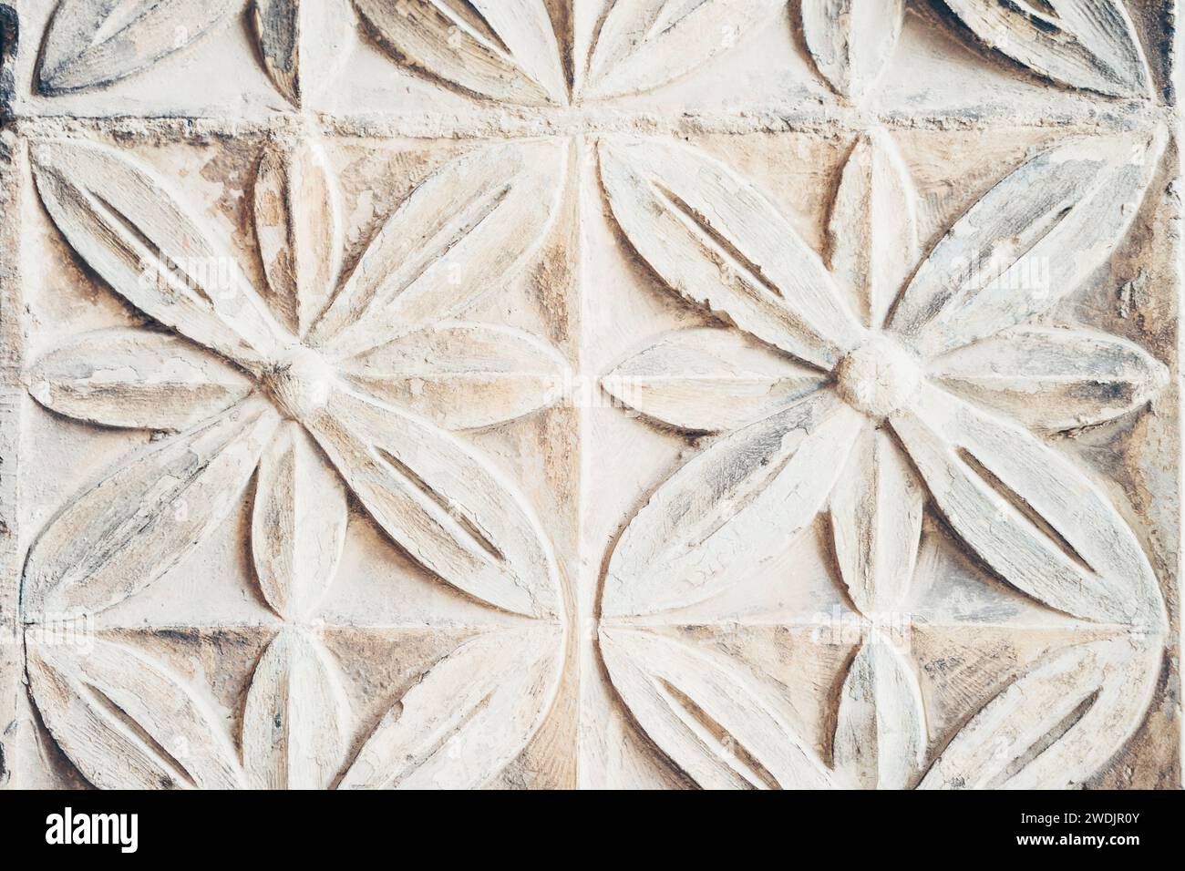 A closeup of stone tiles with flower patterns Stock Photo - Alamy