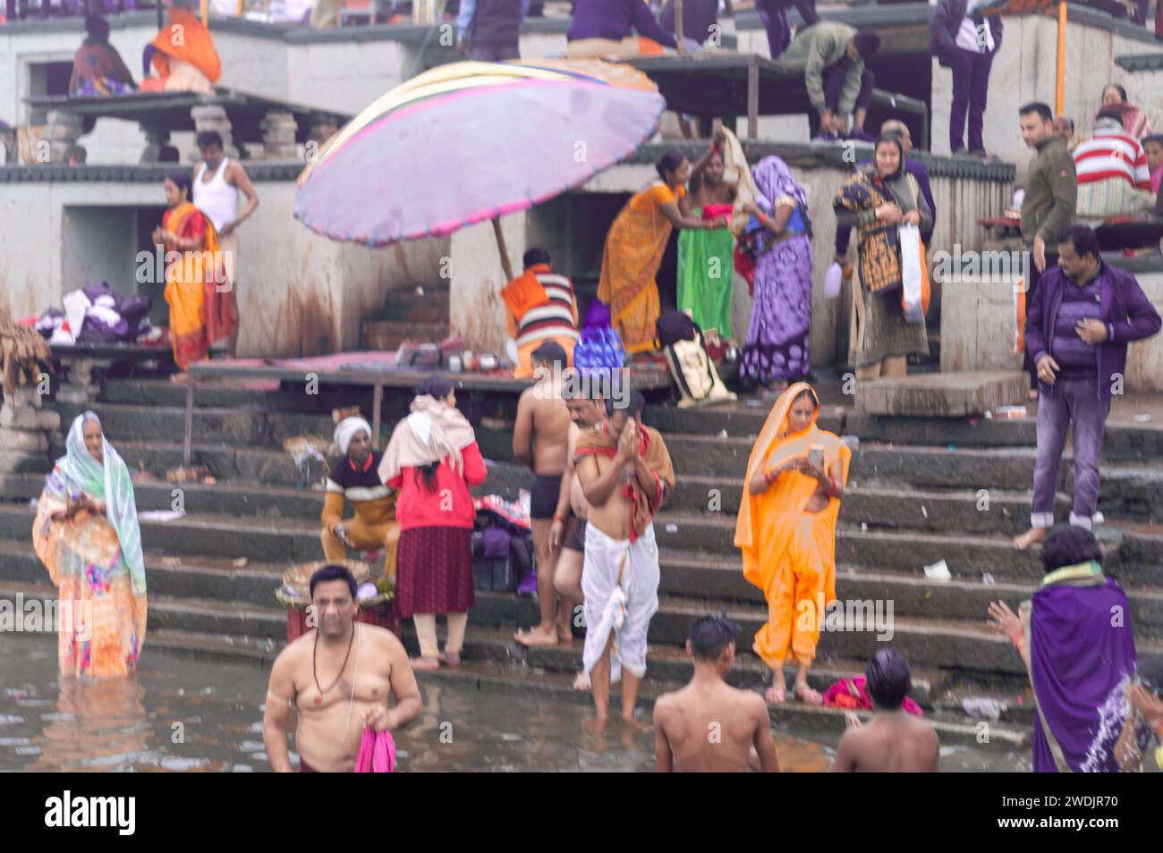 Hindu Sanatan People taking Holi Bath on the Bank of Ganges river in ...