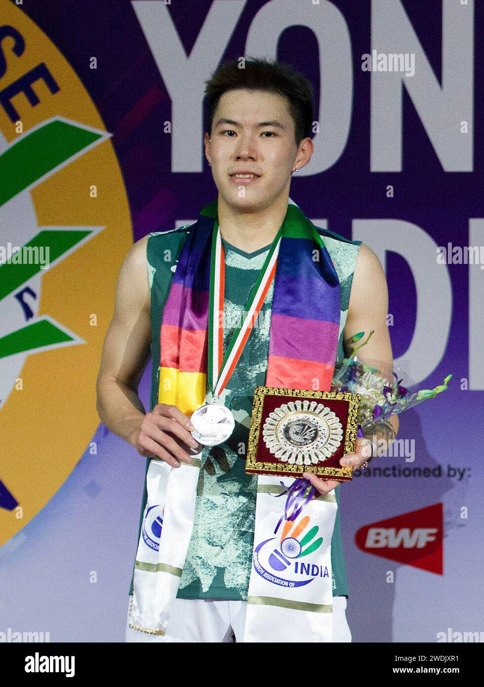 New Delhi, India. 21st Jan, 2024. Runner-up Lee Cheuk Yiu of China's ...