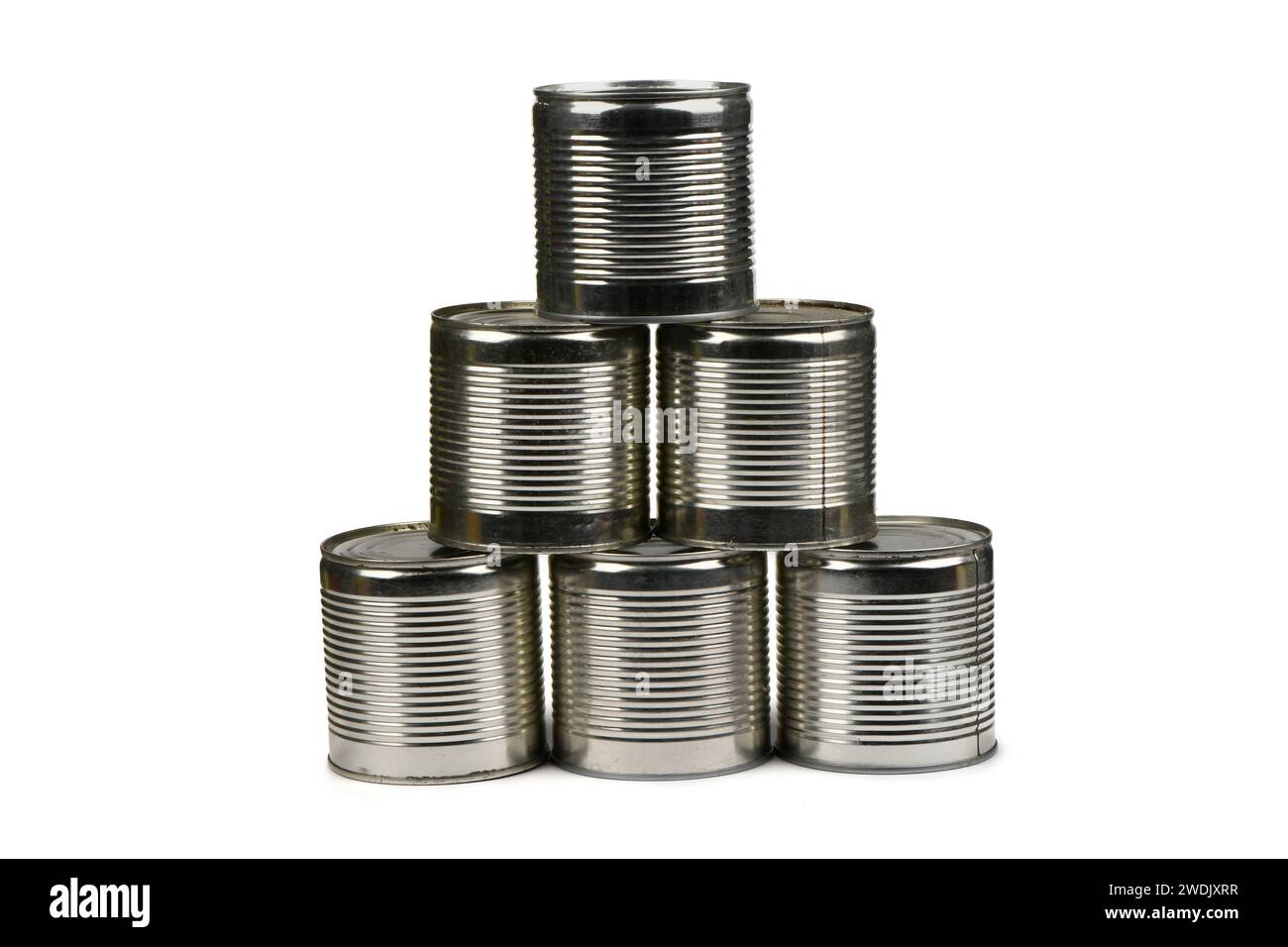 Open metal tin cans placed in pyramid isolated on white background ...