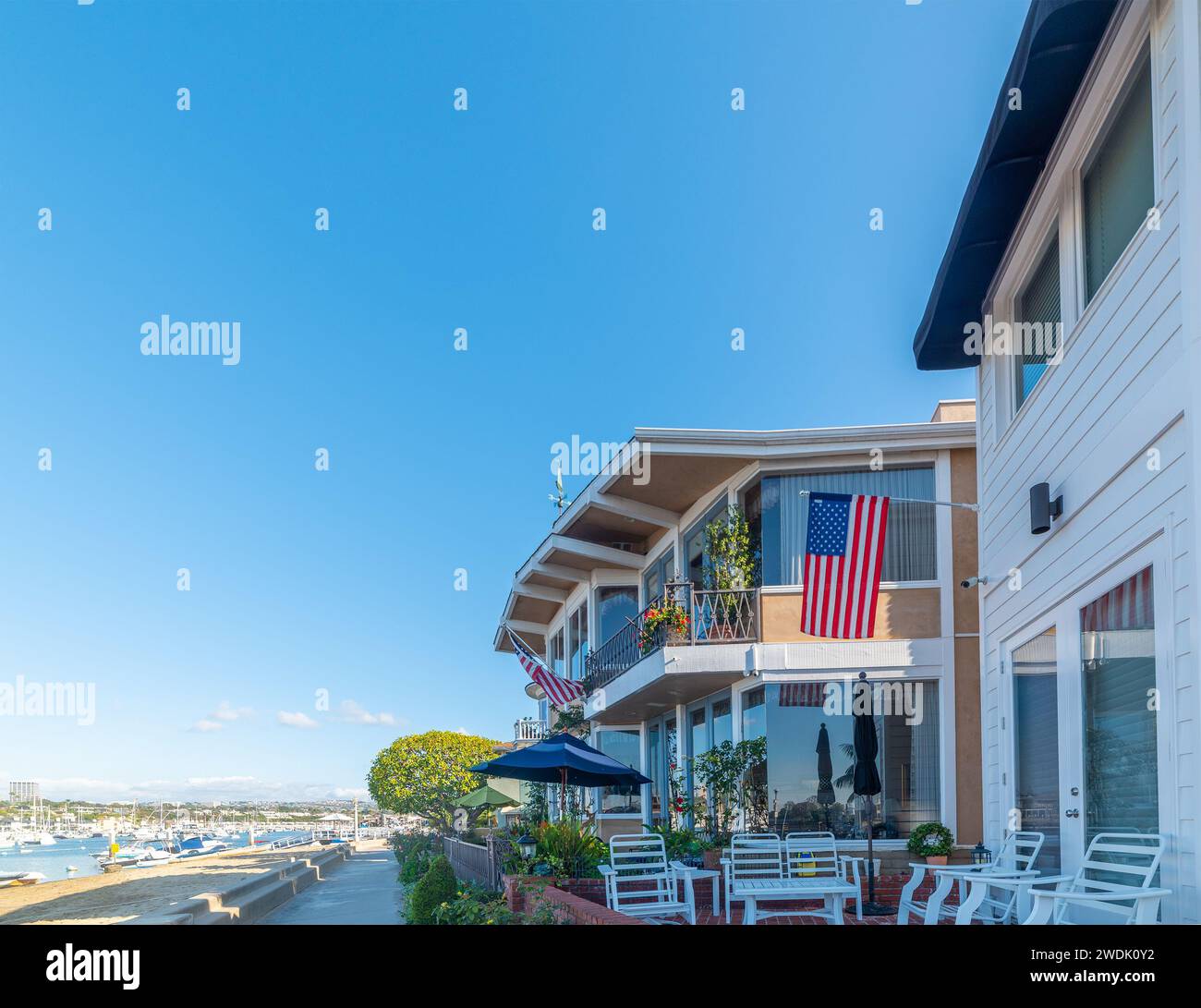Luxury houses by the shore in Balboa island, Newport Beach. California ...