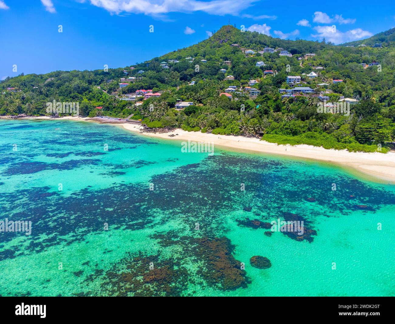 Aerial view of Anse Royale beach turquoise sea. Mahe island, Seychelles ...