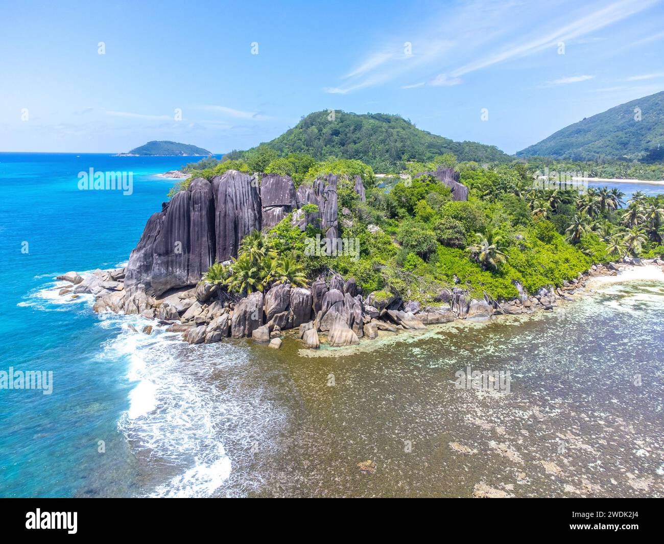 Granite boulders and blue sea in Islette island. Mahe island ...