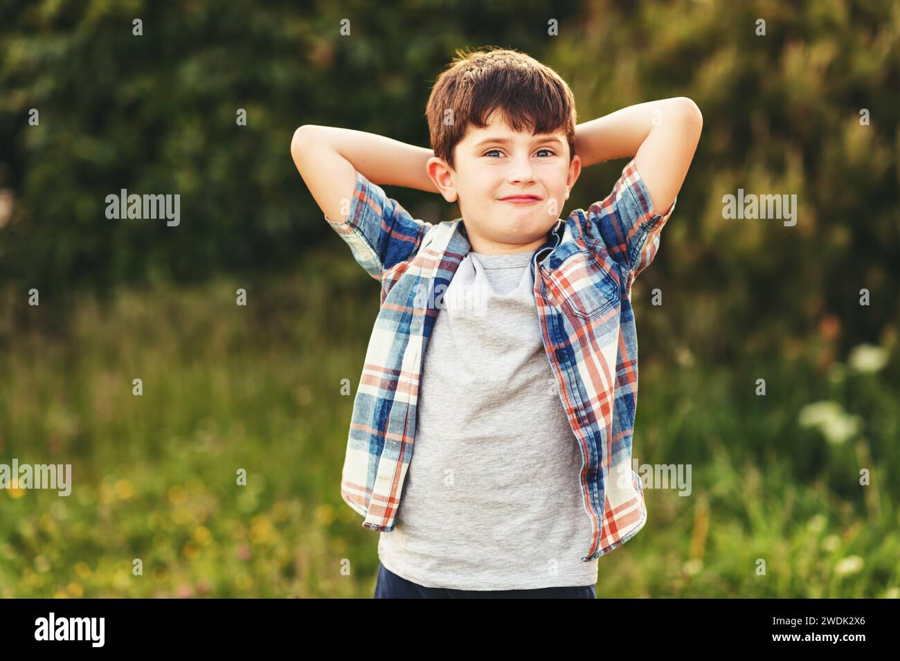 Kid with blue shirt hi-res stock photography and images - Alamy