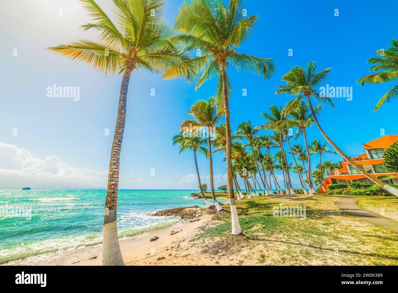 Sun shining over Bas du Fort beach in Guadeloupe, French west indies ...