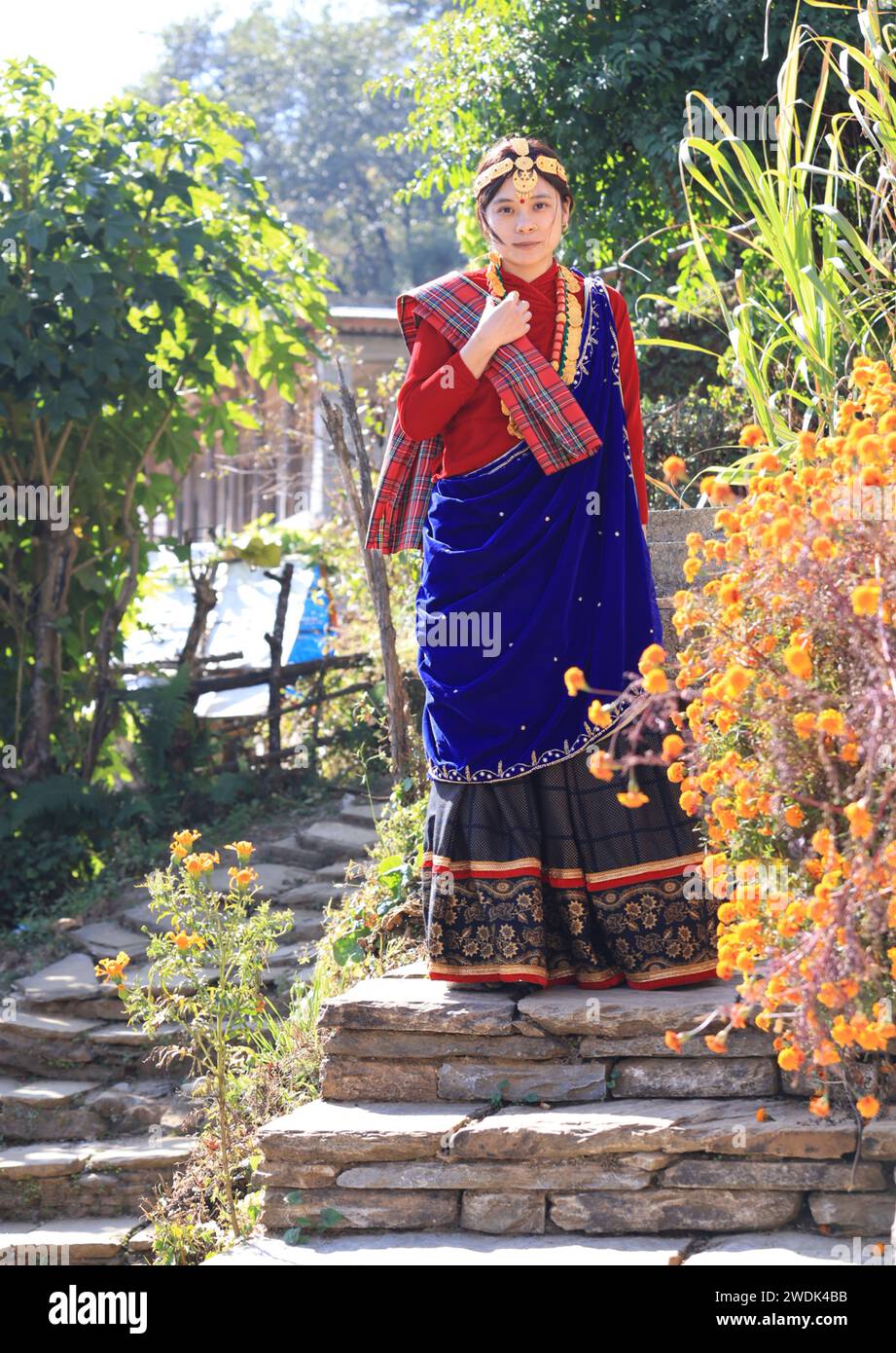 a girl with Gurung traditional dressing a Gurung village in Ghandruk ...