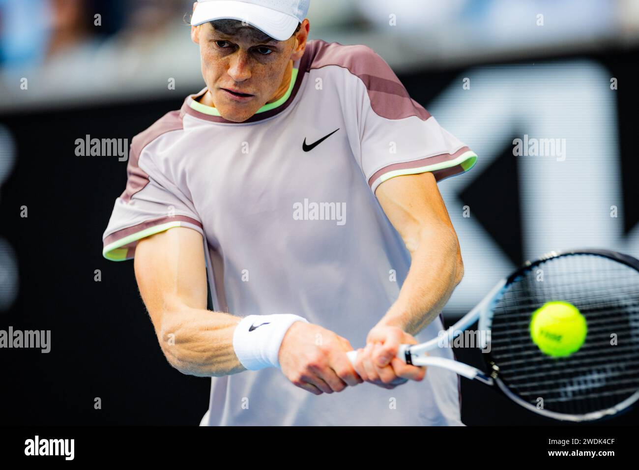 Melbourne, Australia. 21st Jan, 2024. Jannik Sinner hits a return during the men's singles ...