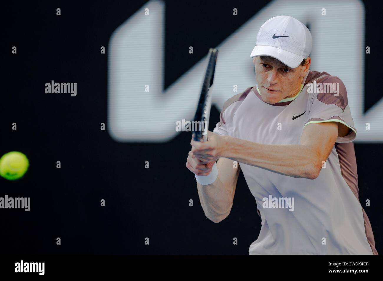 Melbourne, Australia. 21st Jan, 2024. Jannik Sinner hits a return during the men's singles ...