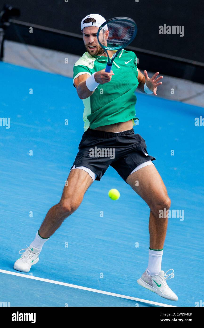 Melbourne, Australia. 21st Jan, 2024. Karen Khachanov hits a return during the men's singles ...