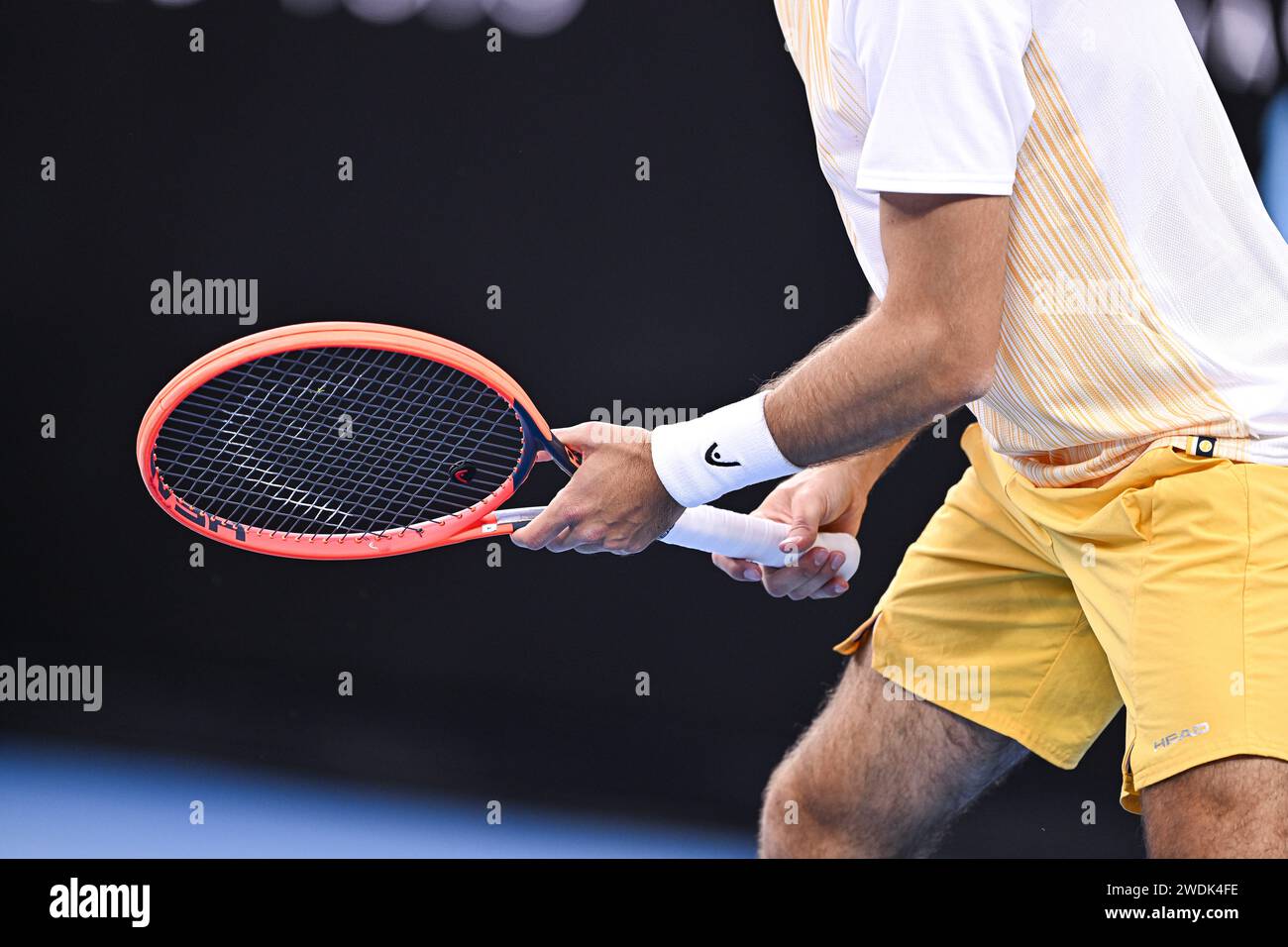 Illustration picture shows the body and racket of a male man player ...