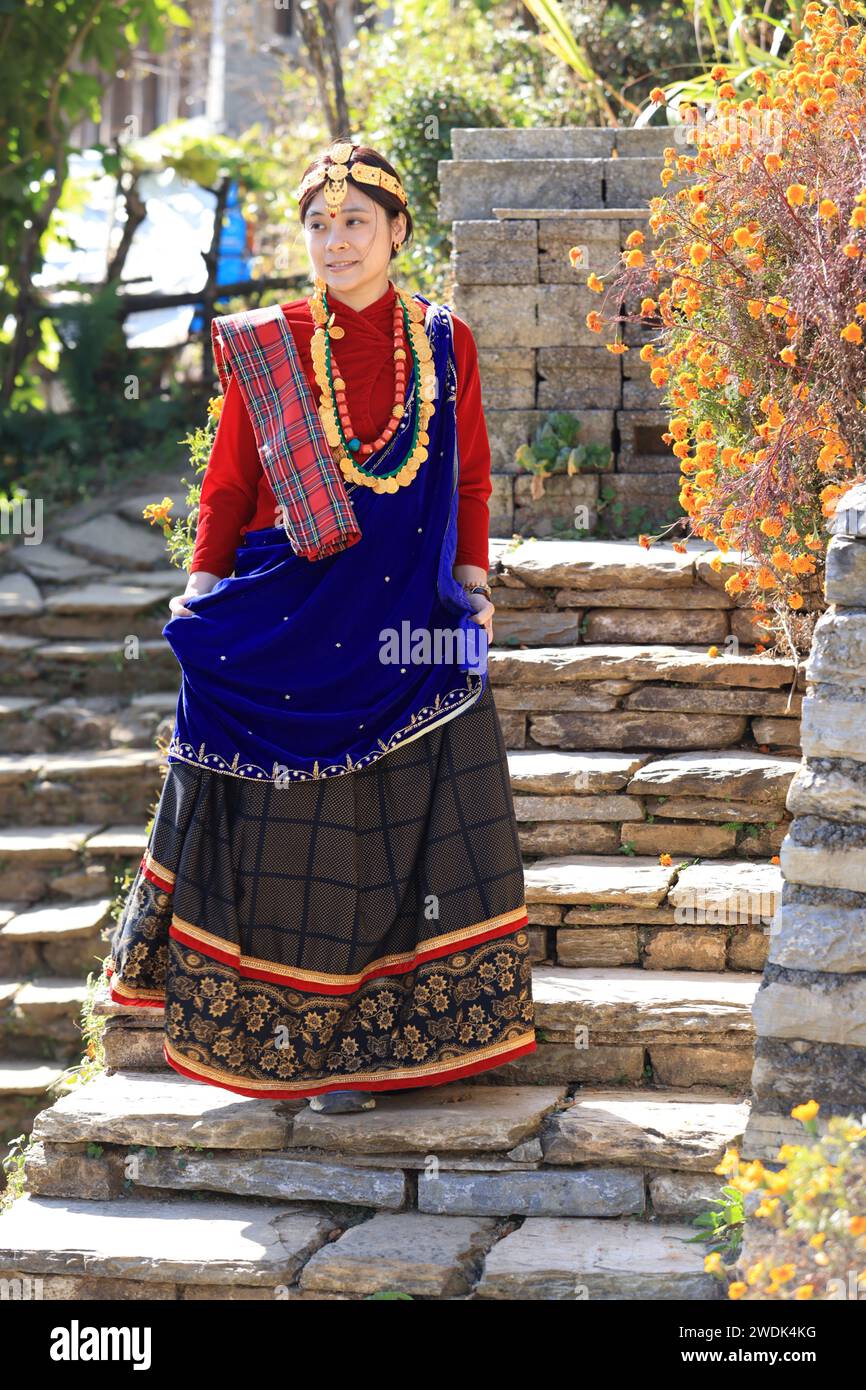 a girl with Gurung traditional dressing a Gurung village in Ghandruk ...