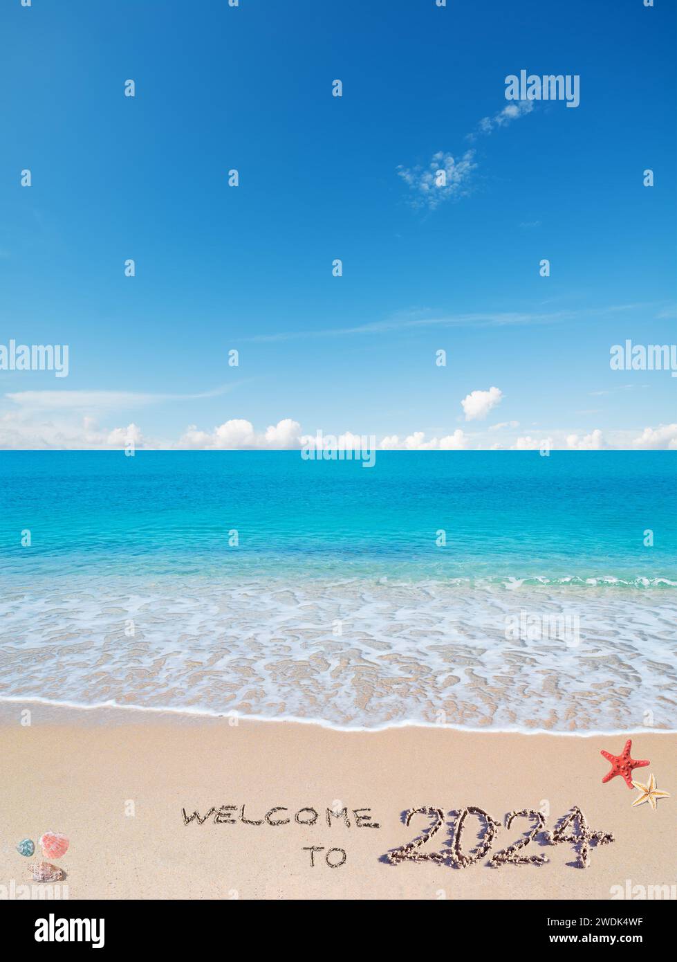 "welcome to 2024" written on a tropical beach Stock Photo - Alamy
