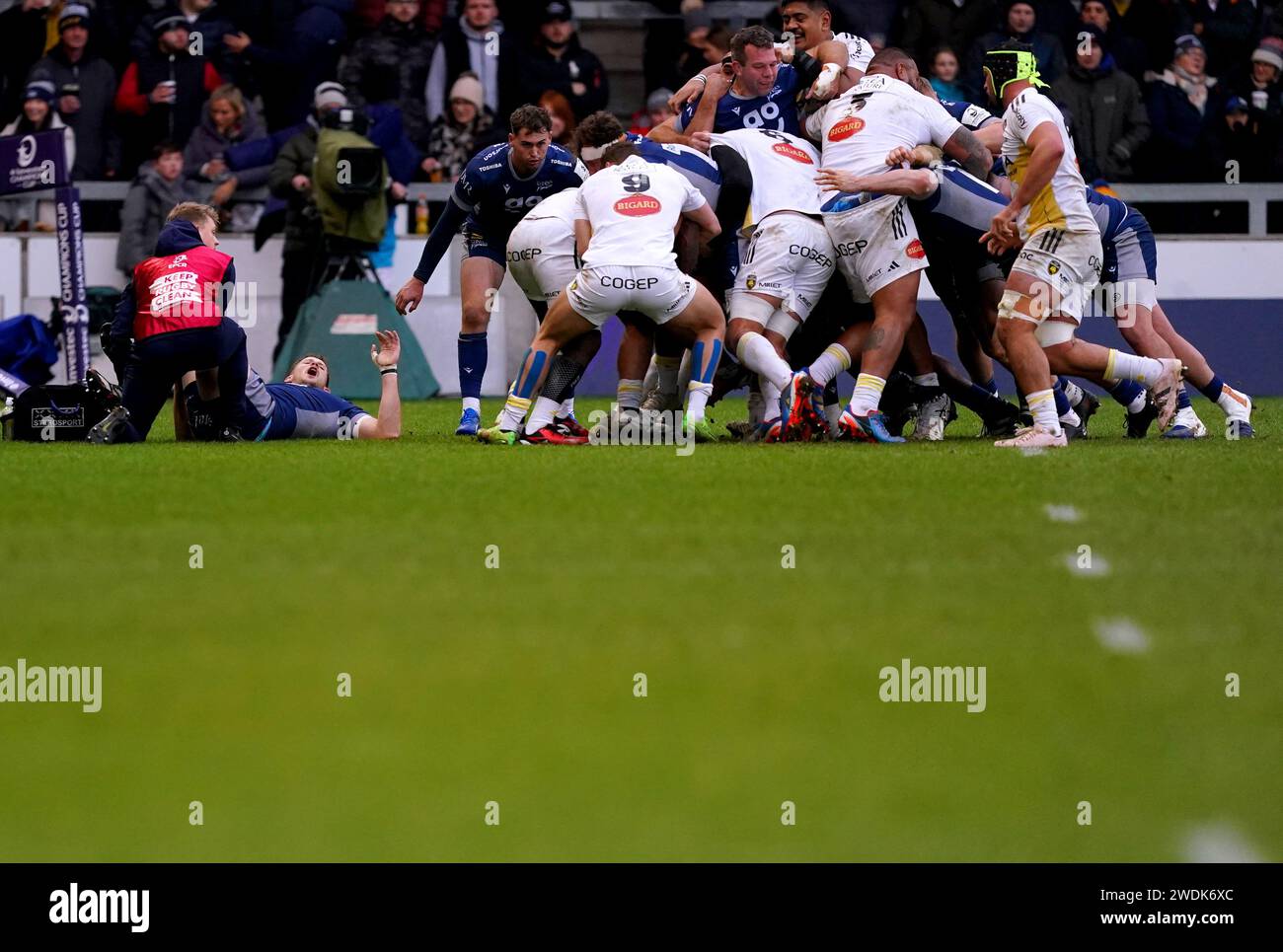 Sale Sharks' Jonny Hill reacts as the pack move closer towards him ...